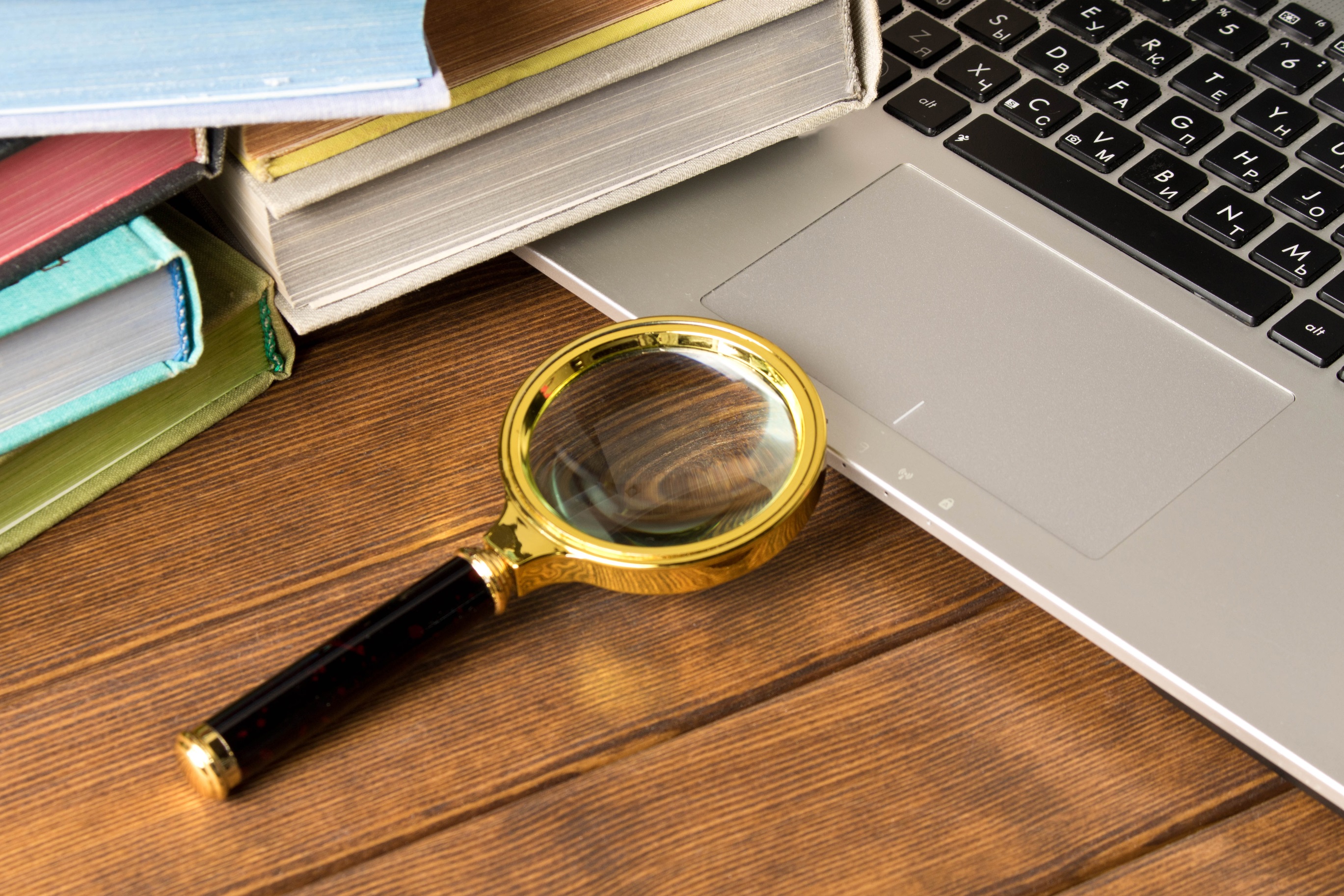 magnifying glass computer books - GrassrootsHealth